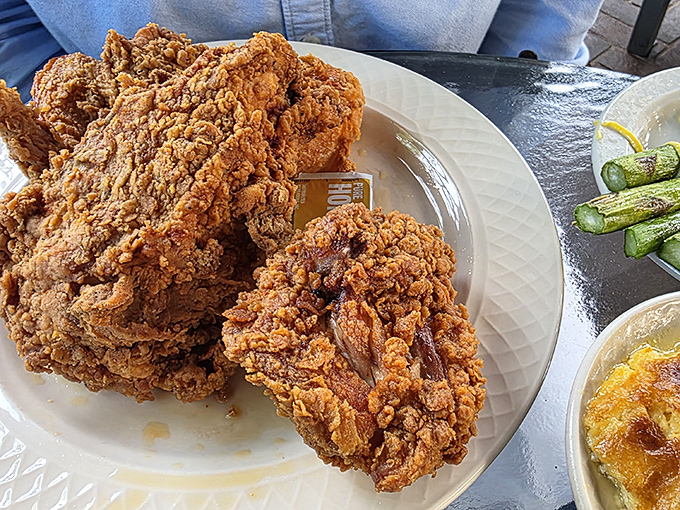 Golden, crispy, ridiculously oversized fried chicken that makes you understand why people plan their entire week around this meal.
