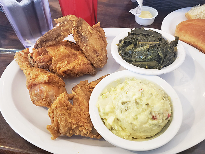 Golden-brown perfection that makes time stand still. This fried chicken, with collards and potato salad, is the holy trinity of Southern plates.
