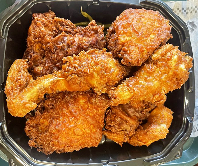 Golden-brown perfection that makes you want to write poetry. This fried chicken doesn't just talk the talk&mdash;each piece crackles with a symphony of crunch and juiciness.