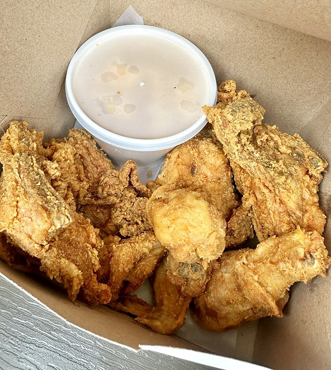 Golden-brown perfection that makes you want to high-five strangers. This fried chicken doesn't just set the bar&mdash;it is the bar.