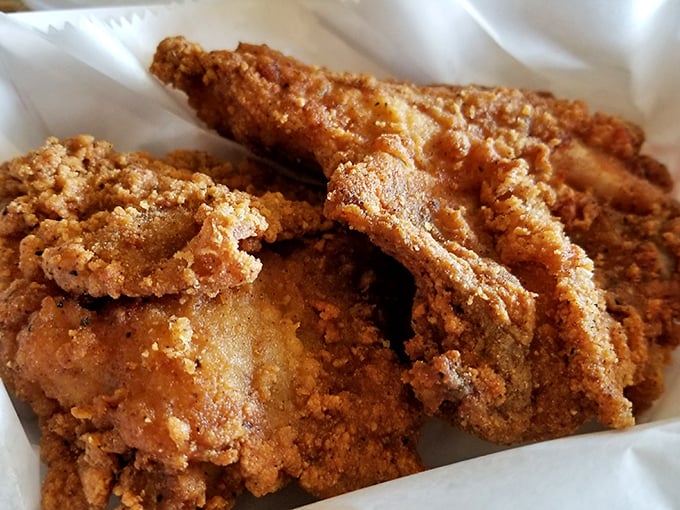 Behold the star of the show&mdash;golden-brown perfection with a crust that shatters just right. This chicken doesn't just speak, it sings.