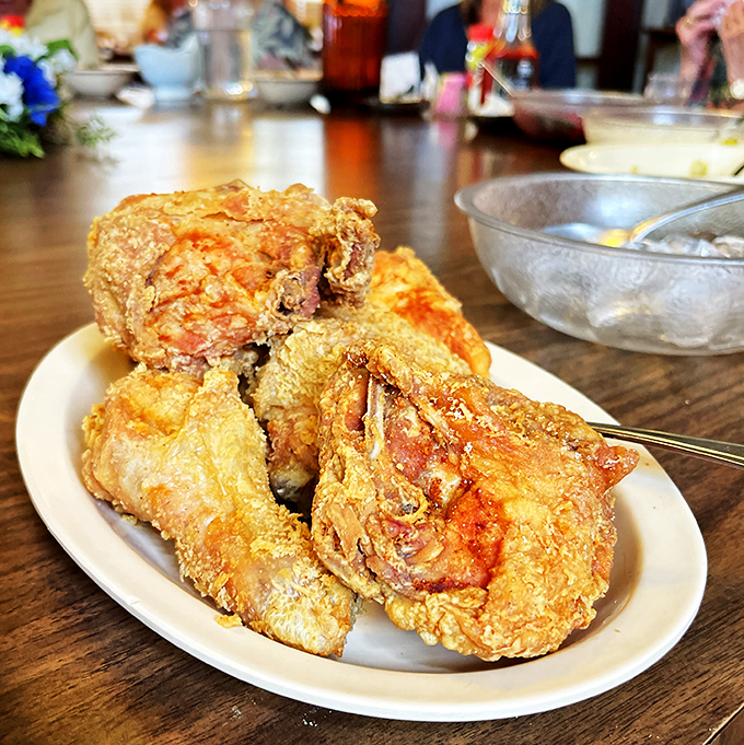 Golden-brown perfection that makes you question if you've ever actually had fried chicken before. This isn't food; it's edible nostalgia.