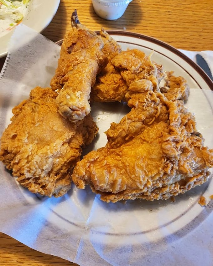 Golden-brown perfection that makes you understand why people cross county lines for fried chicken. That crackling crust is the stuff of dreams.