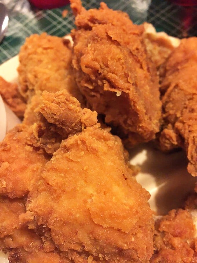 Golden-brown perfection! Each piece of chicken wears its crispy, craggly coating like armor, protecting the juicy treasure within.