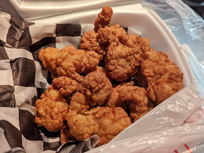 Golden-brown nuggets of fried chicken perfection that crackle with each bite—the kind that makes you wonder why you'd eat chicken any other way.