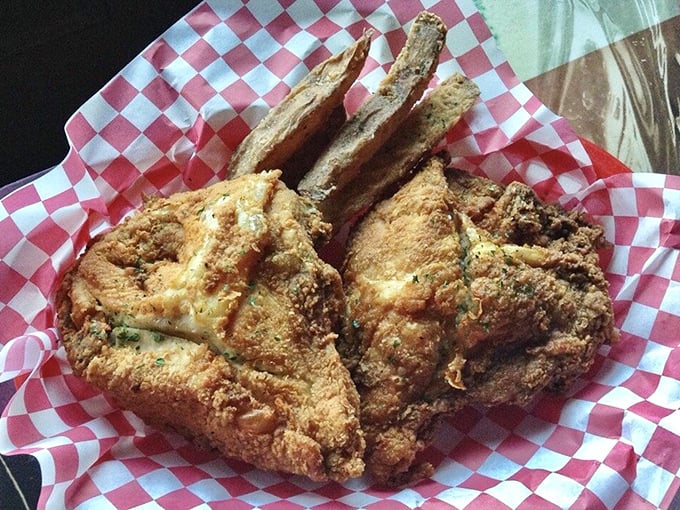 Golden-brown perfection on a red checkered basket &ndash; this fried chicken doesn't need fancy plating when it tastes like your childhood dreams.