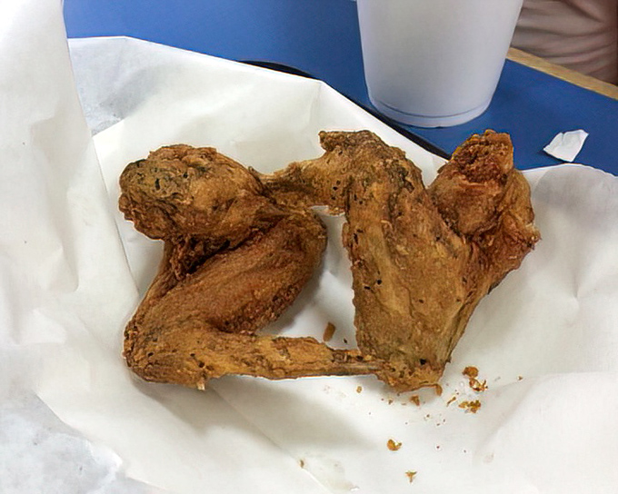Golden-brown wings that could make angels sing. The kind of crispy exterior and juicy interior that makes you wonder why you ever eat anything else.