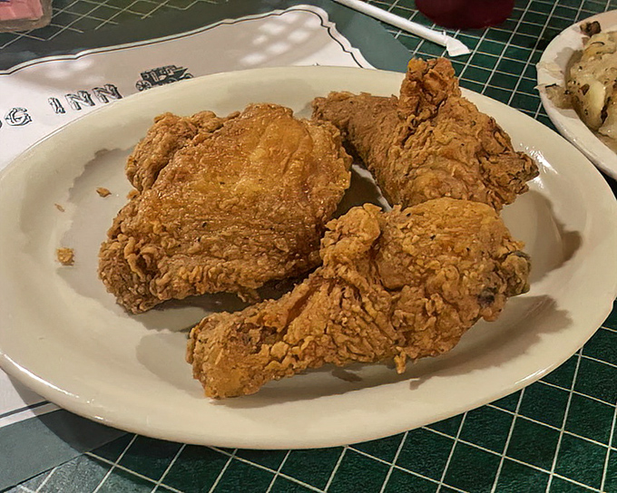Golden-brown perfection on a plate. This fried chicken isn't trying to reinvent the wheel &ndash; it's just showing everyone else how the wheel should have been made.