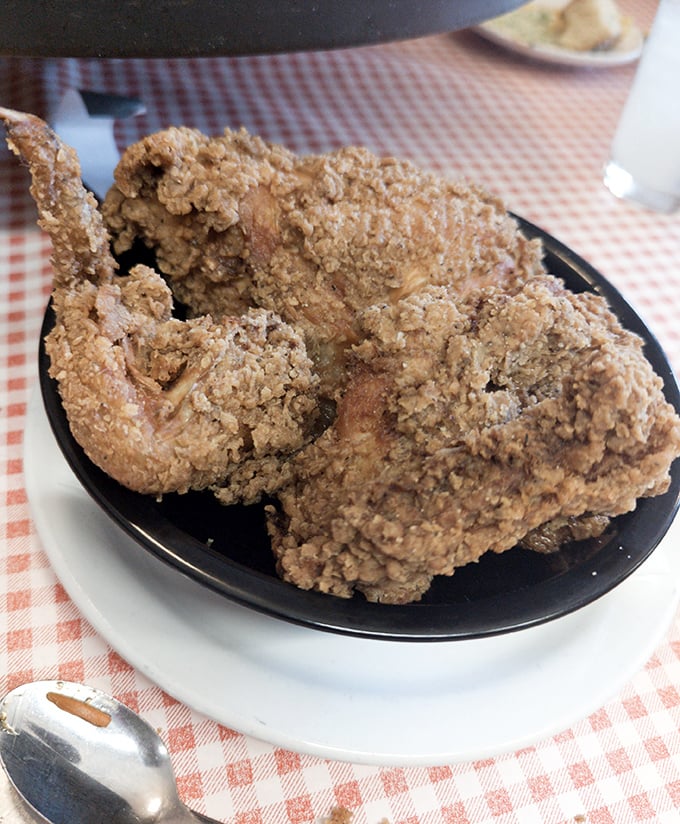 Golden-brown perfection that makes Colonel Sanders look like he's still in culinary kindergarten. This fried chicken deserves its PhD in Deliciousness.