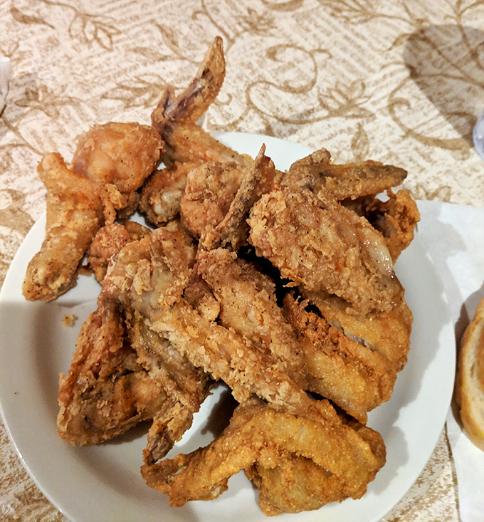 This plate of fried chicken isn't just dinner&mdash;it's edible architecture with a golden-brown roof and juicy foundation that would make Colonel Sanders weep with envy.