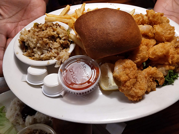 Golden-fried dish that snaps with each bite, served with dirty rice that's anything but clean of flavor.