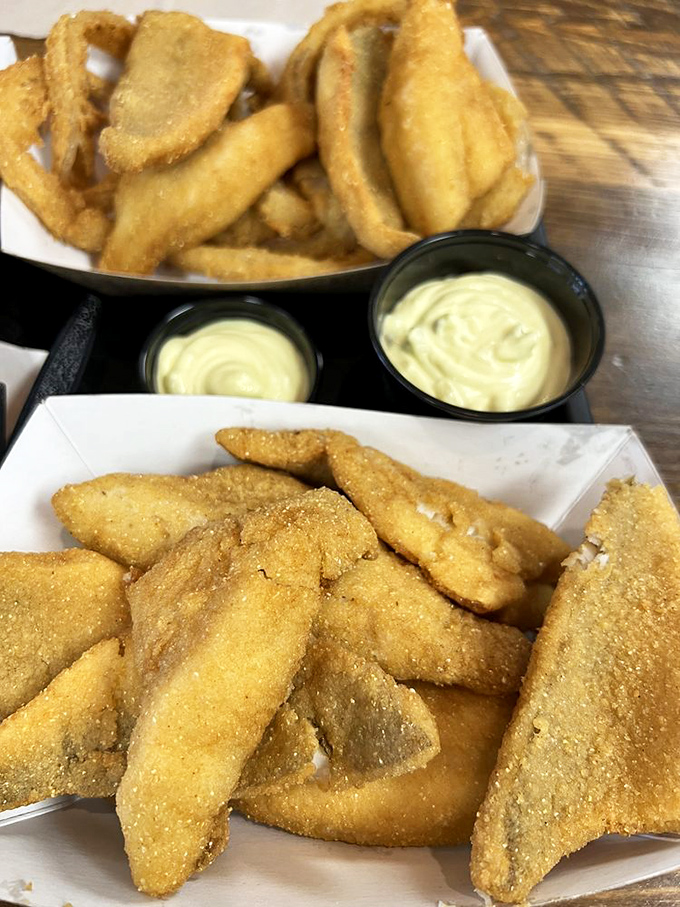 Golden triangles of perfectly fried perch, the local specialty, served with creamy dipping sauces. This is what Lake Erie dreams are made of.