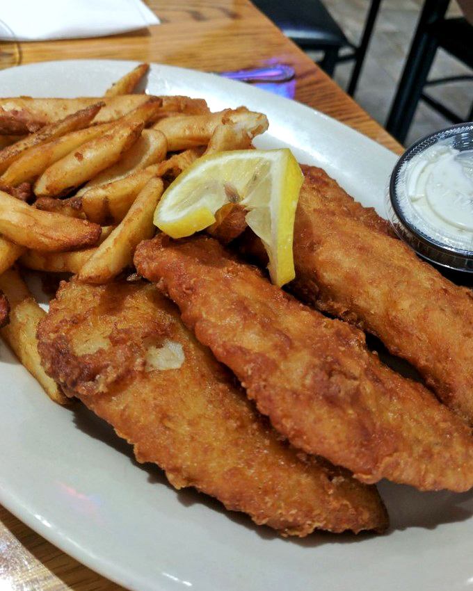 Golden-brown perfection on a plate. This walleye achieves that mythical balance&mdash;shatteringly crisp exterior giving way to flaky, tender fish that practically melts on your tongue.