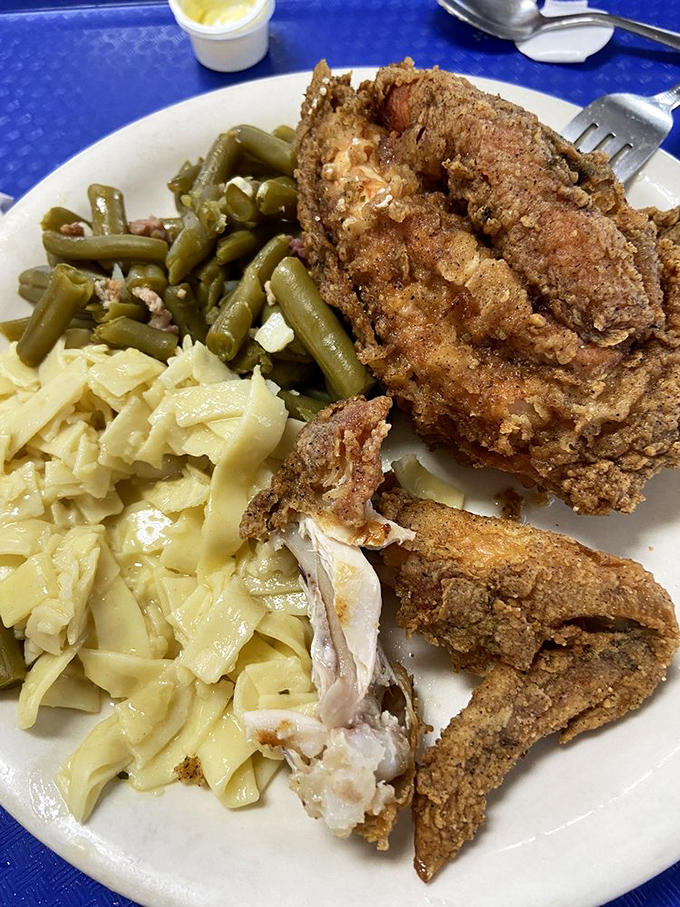 Golden-brown fried chicken that makes you question if you've ever truly experienced fried chicken before. The noodles aren't a side&mdash;they're a destination.