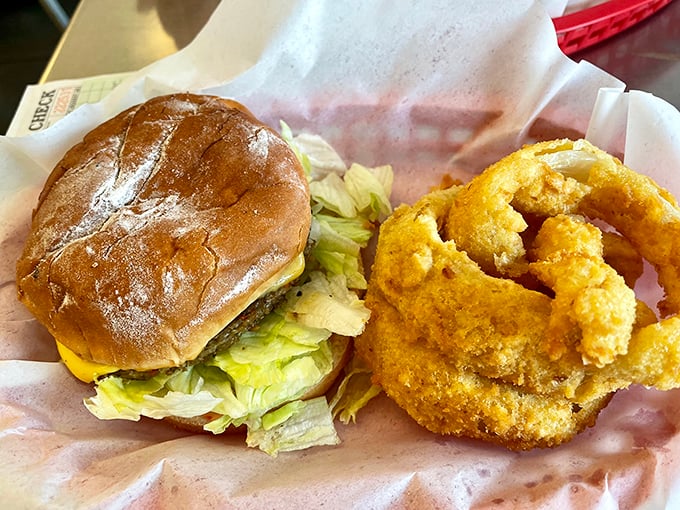 The perfect burger-onion ring alliance. This dynamic duo has been making taste buds dance since before TikTok, Instagram, or even MySpace existed.