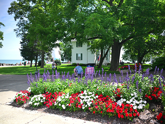 Not just a lighthouse&mdash;a garden paradise. These vibrant blooms add a splash of patriotic color to an already picture-perfect scene.