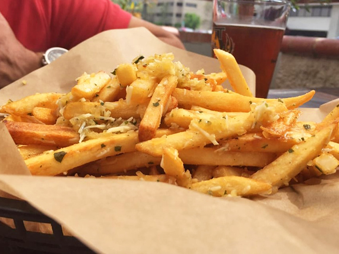 Golden, glistening, and gloriously garlicky &ndash; these aren't just fries, they're a religious experience dusted with parmesan and fresh herbs.