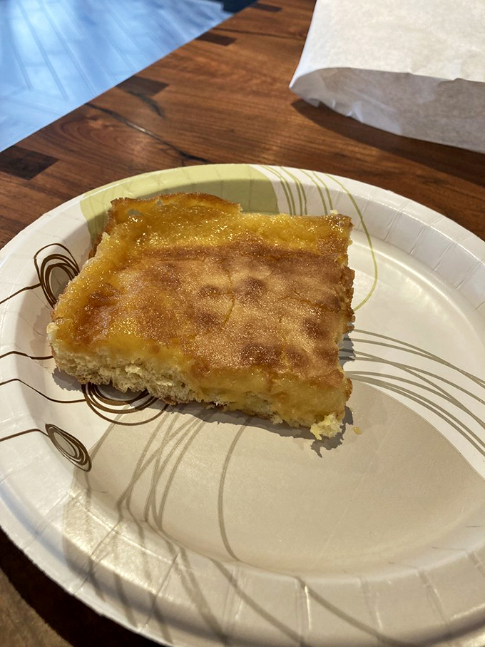 Behold the holy grail of St. Louis cuisine&mdash;gooey butter cake in its natural habitat. That golden-topped square contains more joy than most wedding ceremonies.