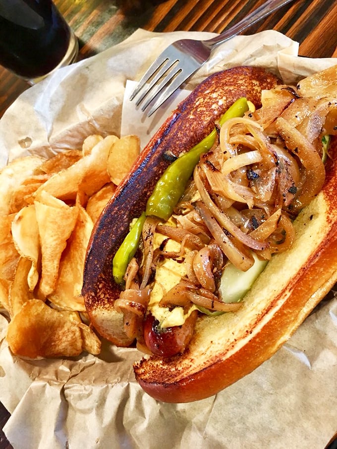 This isn't just a hot dog&mdash;it's an architectural masterpiece of caramelized onions, peppers, and perfectly grilled sausage that makes ketchup seem like finger painting next to fine art.