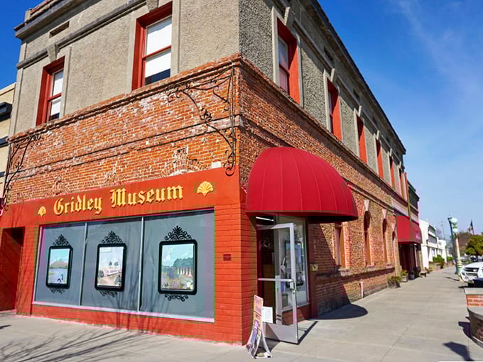 The Gridley Museum's vibrant red facade houses the town's history in a building that's seen more changes than a Hollywood marriage.