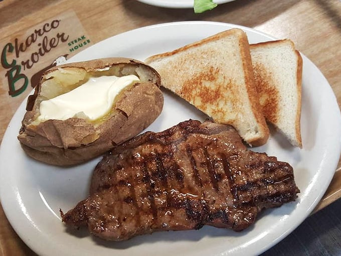 This is what dreams are made of&mdash;a perfectly charred steak, butter-drenched potato, and toast ready for juice-sopping duty.