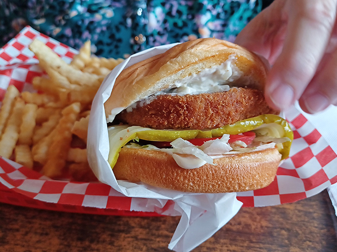 This isn't just a fish sandwich&mdash;it's maritime perfection on a bun, with crispy halibut that would make Neptune himself swim upstream for a bite.