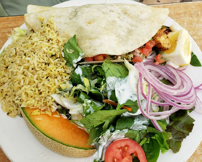 Not just a taco, but a coastal celebration on a plate. The rice, the greens, the perfectly grilled fish&mdash;it's California's bounty wrapped in a warm embrace.