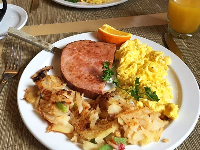 Golden hash browns, perfectly scrambled eggs, and ham that understands its assignment&mdash;this is morning done right.
