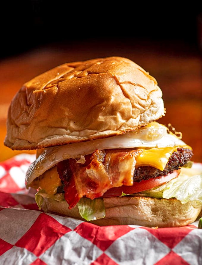 This isn't just a burger &ndash; it's a masterpiece of architecture where bacon, egg, and cheese create the holy trinity of hangover remedies.