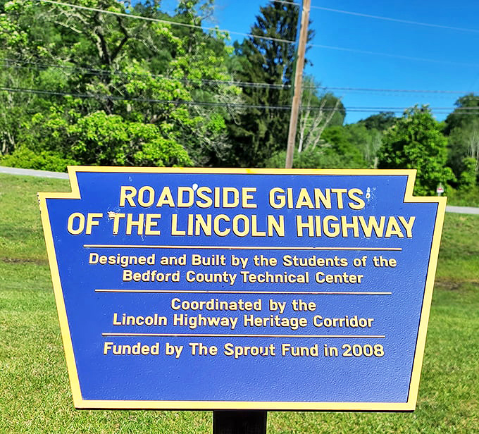 The blue historical marker reveals this metallic marvel was crafted by Bedford County Technical Center students&mdash;proving education really does pay.