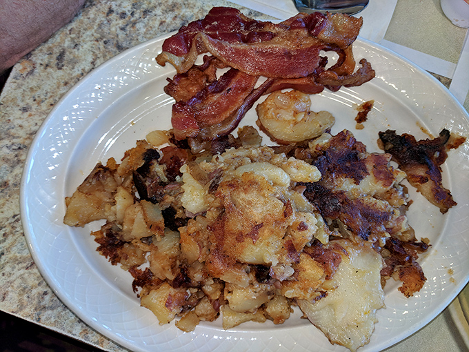 These legendary home fries achieve crispy perfection that would make any potato proud of its destiny.