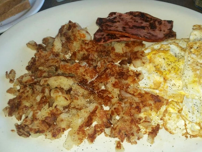 These aren't just home fries; they're potato perfection that would make your grandmother simultaneously proud and jealous of their crispy-outside, fluffy-inside magic.