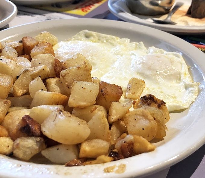 These home fries aren't just potatoes; they're little golden cubes of breakfast joy that make you question why you ever settled for lesser spuds.