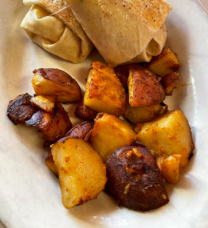 Golden-brown cubes of potato perfection &ndash; these aren't just home fries, they're little crispy monuments to what breakfast should always be.