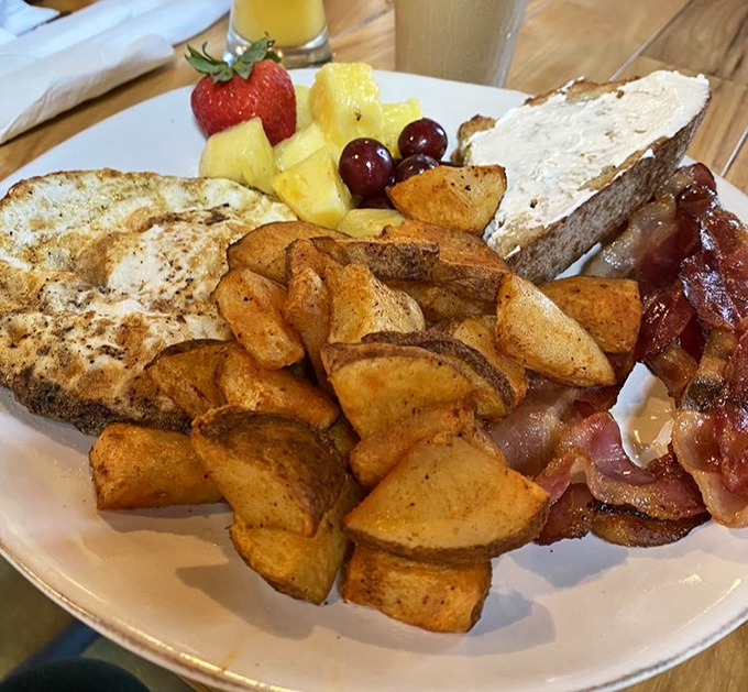 Breakfast perfection doesn't exi&mdash; Oh wait, it does. Golden potatoes, crispy bacon, and fresh fruit create the holy trinity of morning satisfaction.
