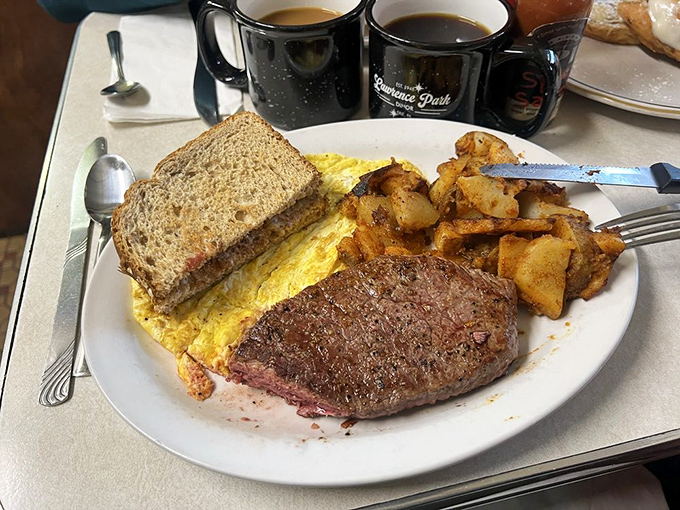 This plate means business – the kind of hearty breakfast that built America, one satisfied stomach at a time.