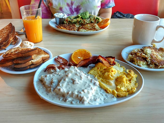 Biscuits smothered in sausage gravy alongside golden eggs and crispy bacon&mdash;the breakfast trinity that launched a thousand naps.