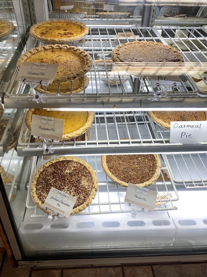 Behold the pie case of dreams! Custard, pumpkin, and oatmeal pies wait patiently for their moment of glory at your table.