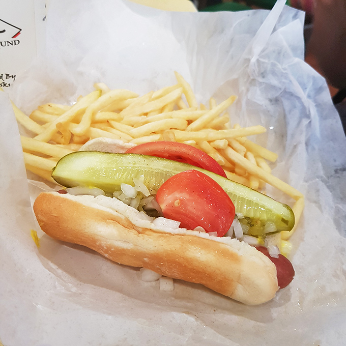 Chicago's hot dog tradition done right&mdash;dressed with fresh toppings and nestled alongside golden fries. No ketchup in sight, as the food gods intended.