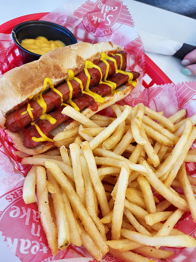 Not just any hot dog&mdash;a masterpiece of balance. That zigzag of mustard isn't decoration, it's edible architecture!