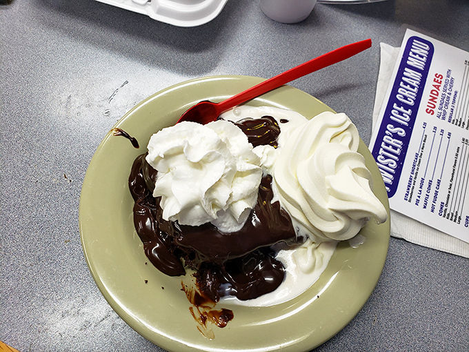 The legendary hot fudge cake in its natural habitat&mdash;where warm chocolate cake meets cold ice cream in a romance that puts The Notebook to shame.
