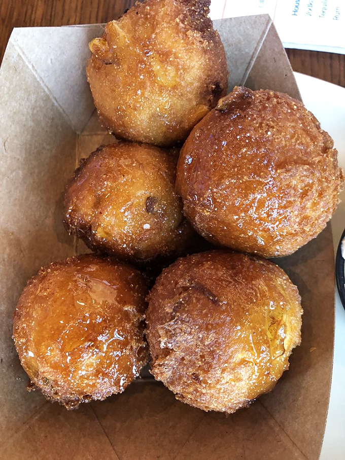 Golden-brown hush puppies that could make a Southerner weep with joy&mdash;crispy exterior giving way to a pillowy cornmeal center.