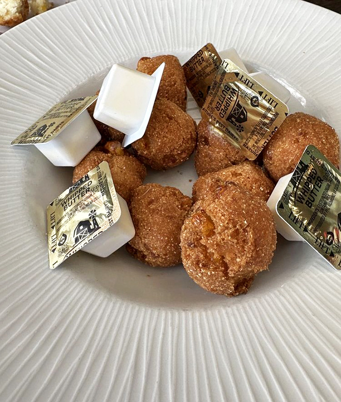 Golden orbs of cornmeal perfection that make you question why you've wasted time on lesser hush puppies your entire life.