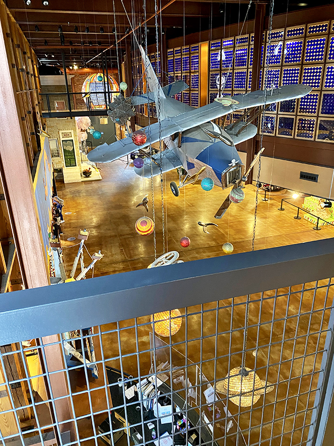 Suspended from the ceiling, this vintage airplane installation soars through the museum's atrium. It's as if someone's magnificent dream took flight and never came back down to earth.