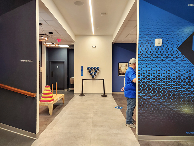 Clean lines and geometric patterns prepare your brain for the visual trickery ahead. Even the museum's hallways prime your mind for the coming confusion.