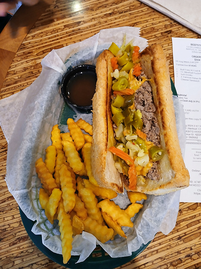 The star of the show: thinly-sliced beef, perfectly seasoned, piled high on that magical bread with giardiniera that bites back just right.