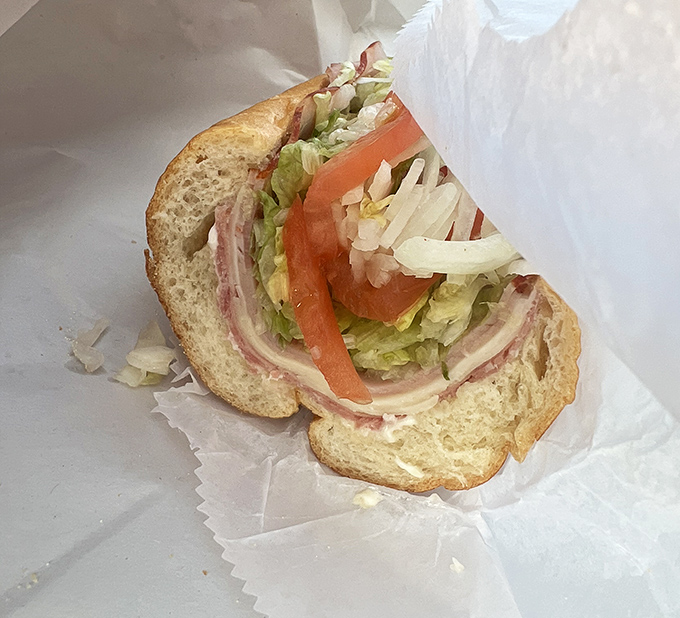 Behold the architectural marvel that is Cosmi's Italian hoagie. Layer upon layer of thinly sliced meats, veggies, and magic between bread.