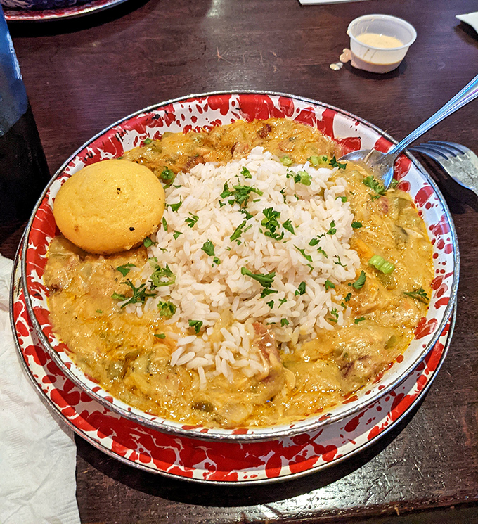 Jambalaya that would make New Orleans jealous &ndash; rice islands surrounded by a flavorful sea of Cajun goodness and that essential cornbread lifeboat.
