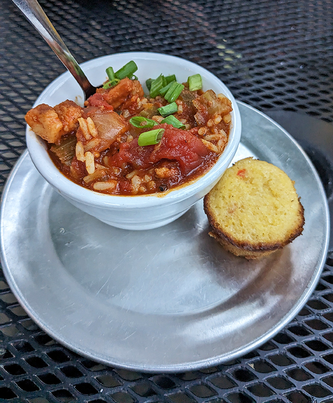 This jambalaya isn't just food&mdash;it's edible jazz, with each spoonful delivering a perfectly orchestrated medley of flavors alongside cornbread that demands respect.