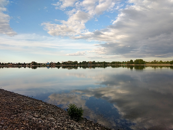 Jensen's Lake mirrors the big Idaho sky, offering peaceful reflection without the meditation app subscription fees that city folks pay monthly. 